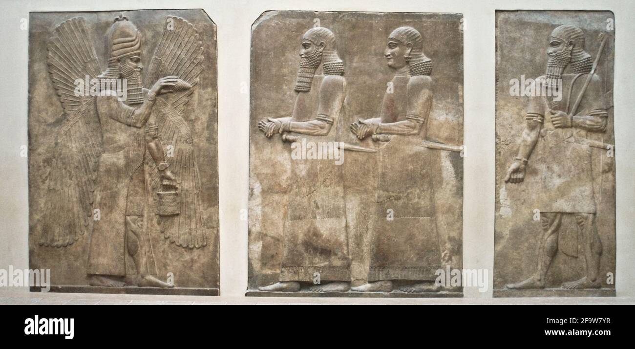 Human figures relief. Mesopotamian art. Louvre Museum Stock Photo - Alamy