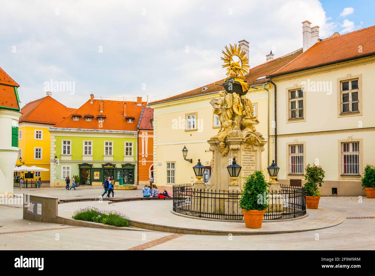 GYOR, HUNGARY MAY 20, 2016: People are walking around the Arch of the ...
