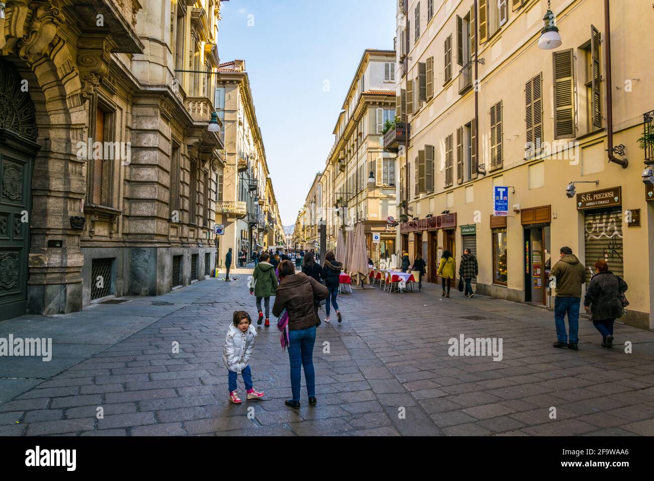TORINO, ITALY, MARCH 12, 2016: people are walking on a street in the ...