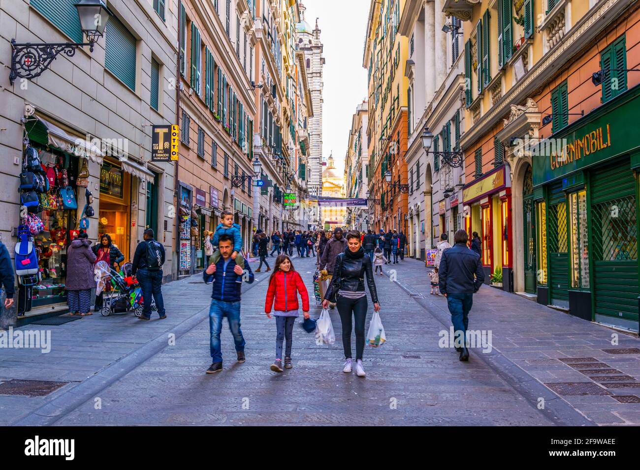 GENOA, ITALY, MARCH 13, 2016: people are walking through via di canneto ...