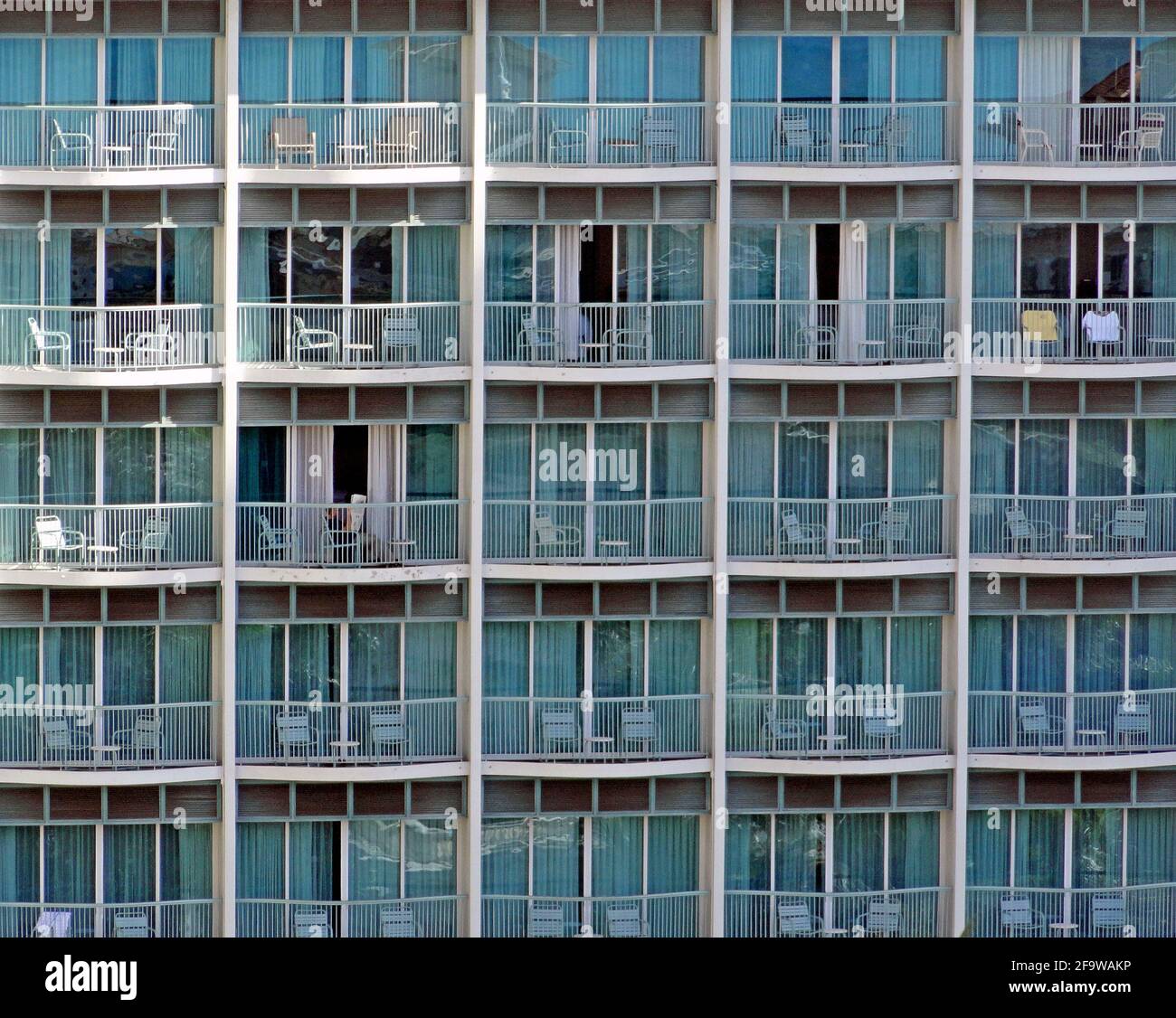 Glass building facade with many balconies Stock Photo - Alamy