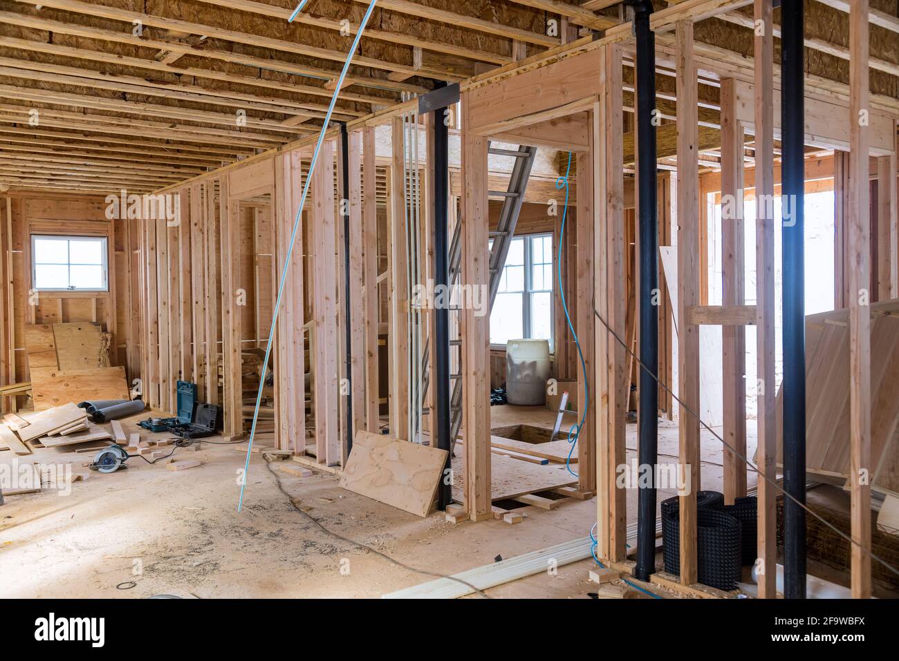 Wood framework of home under construction in progress residential beam ...