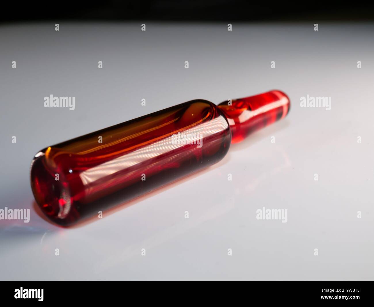 Closeup shot of medicine ampoule Stock Photo - Alamy