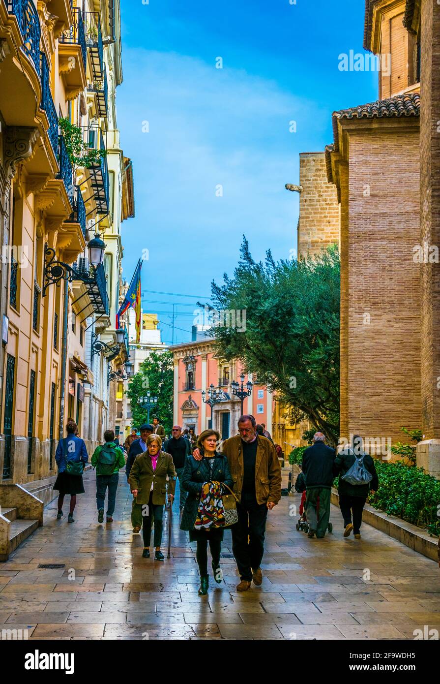 VALENCIA, SPAIN, DECEMBER 30, 2015: People are passing by the cathedral ...