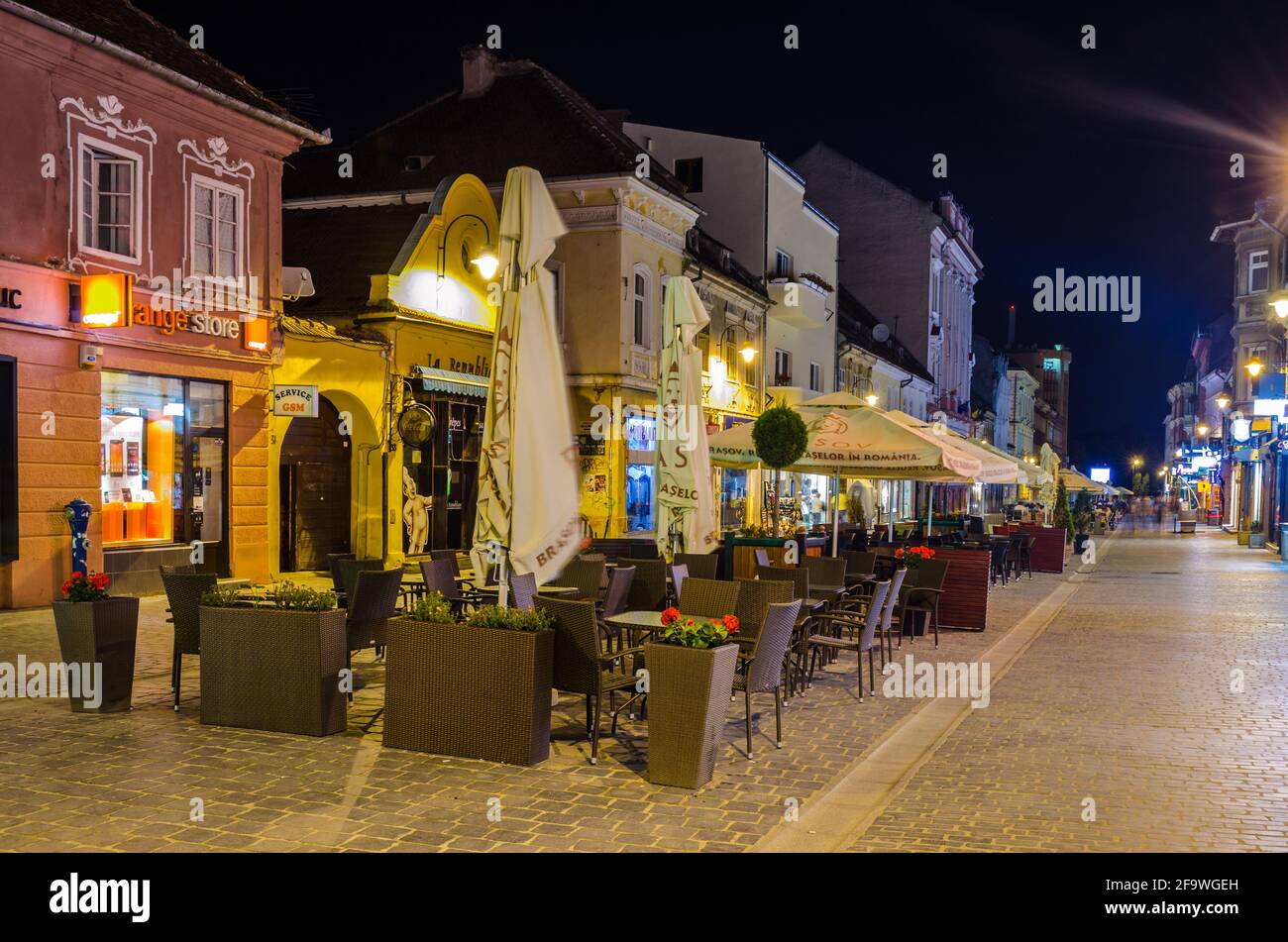 BRASOV, ROMANIA, JULY 9, 2015: Street of the republic is a center of ...