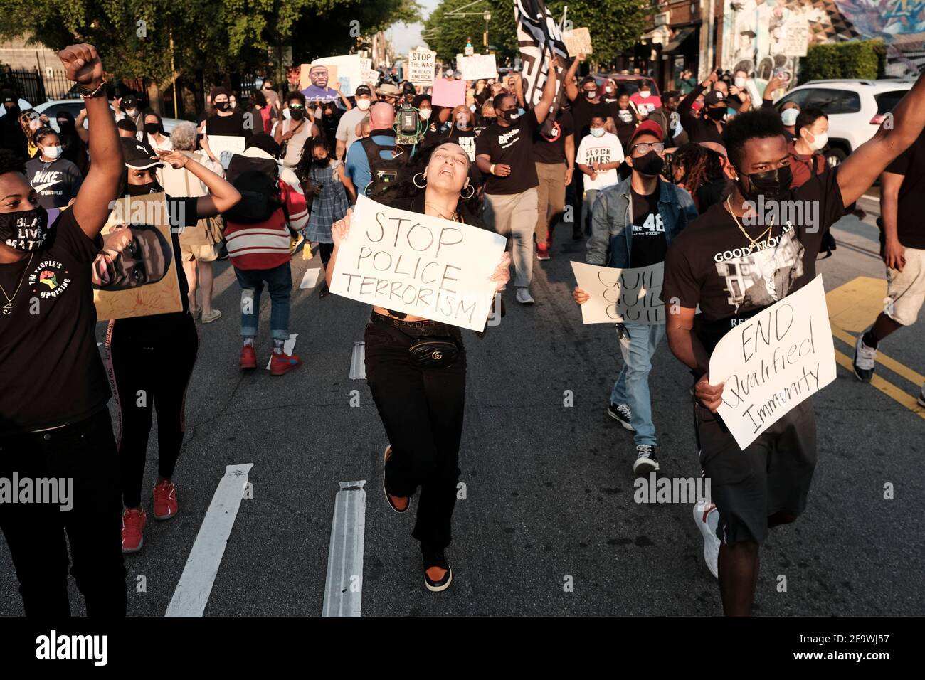 Police officer holding stop sign hi-res stock photography and images ...