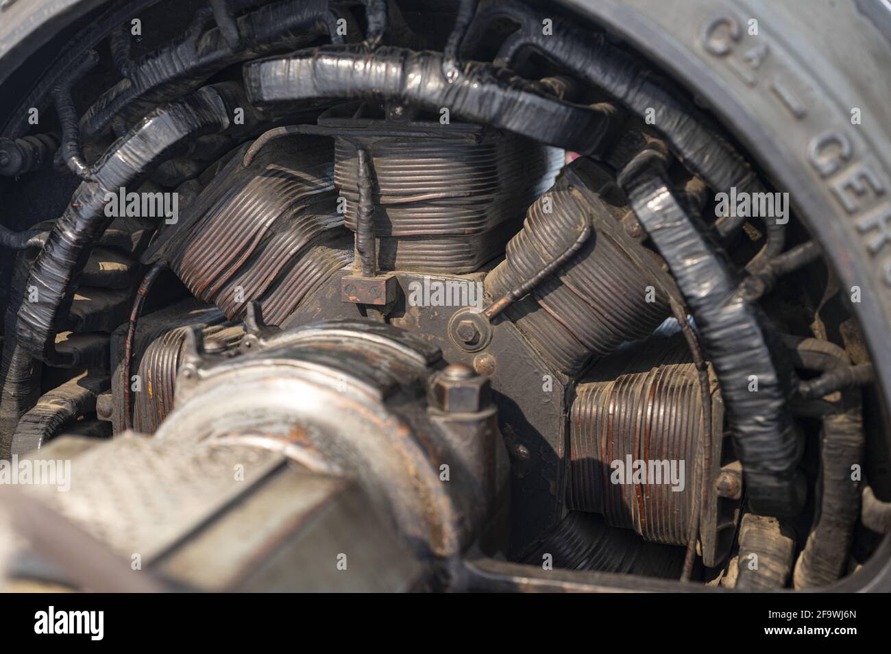 Large electric motor of a factory with coils and the rotor Stock Photo ...