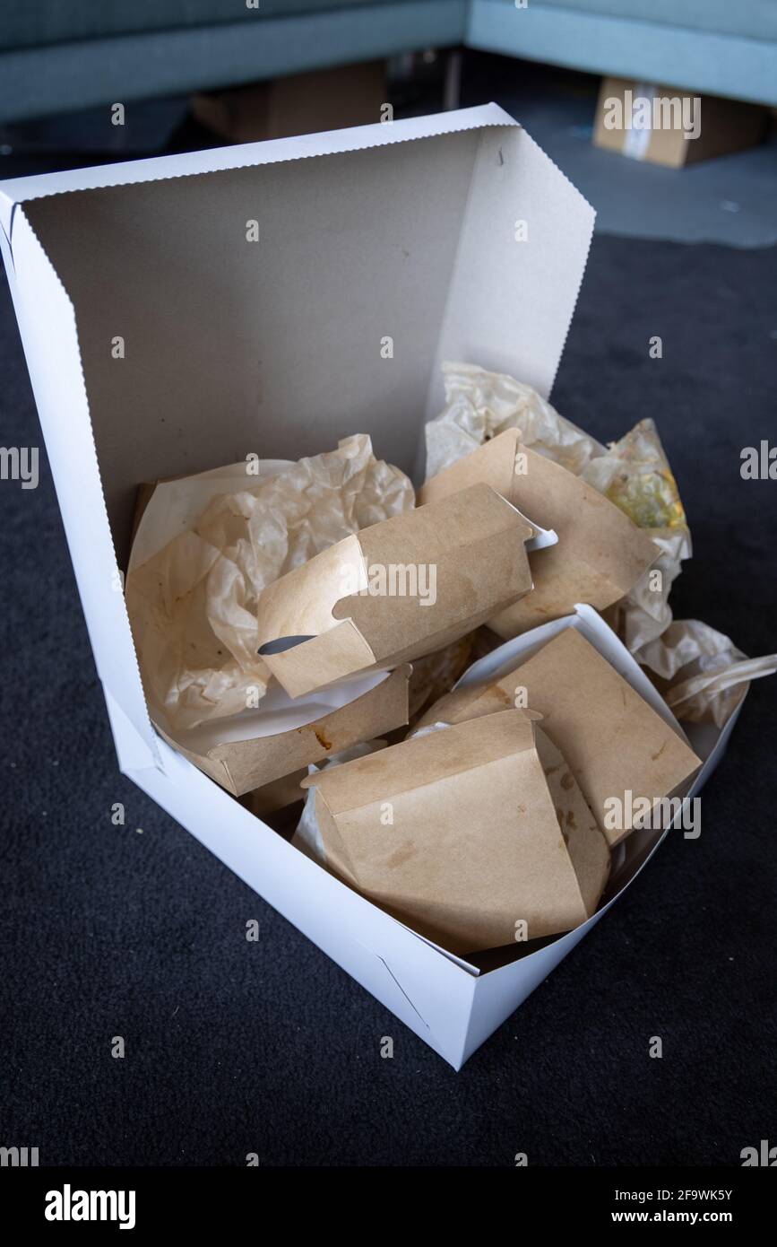 A stack of take away disposable food packages. Increase of waste and ...