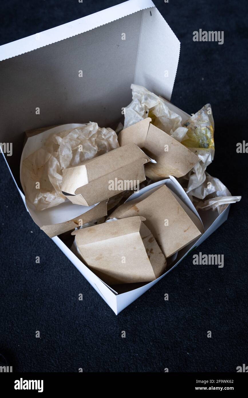 A stack of take away disposable food packages. Increase of waste and ...