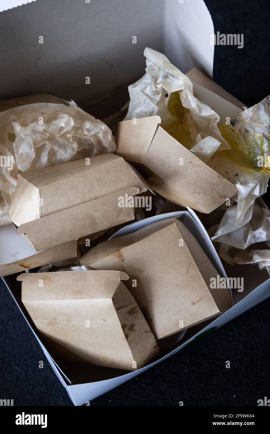 A stack of take away disposable food packages. Increase of waste and ...