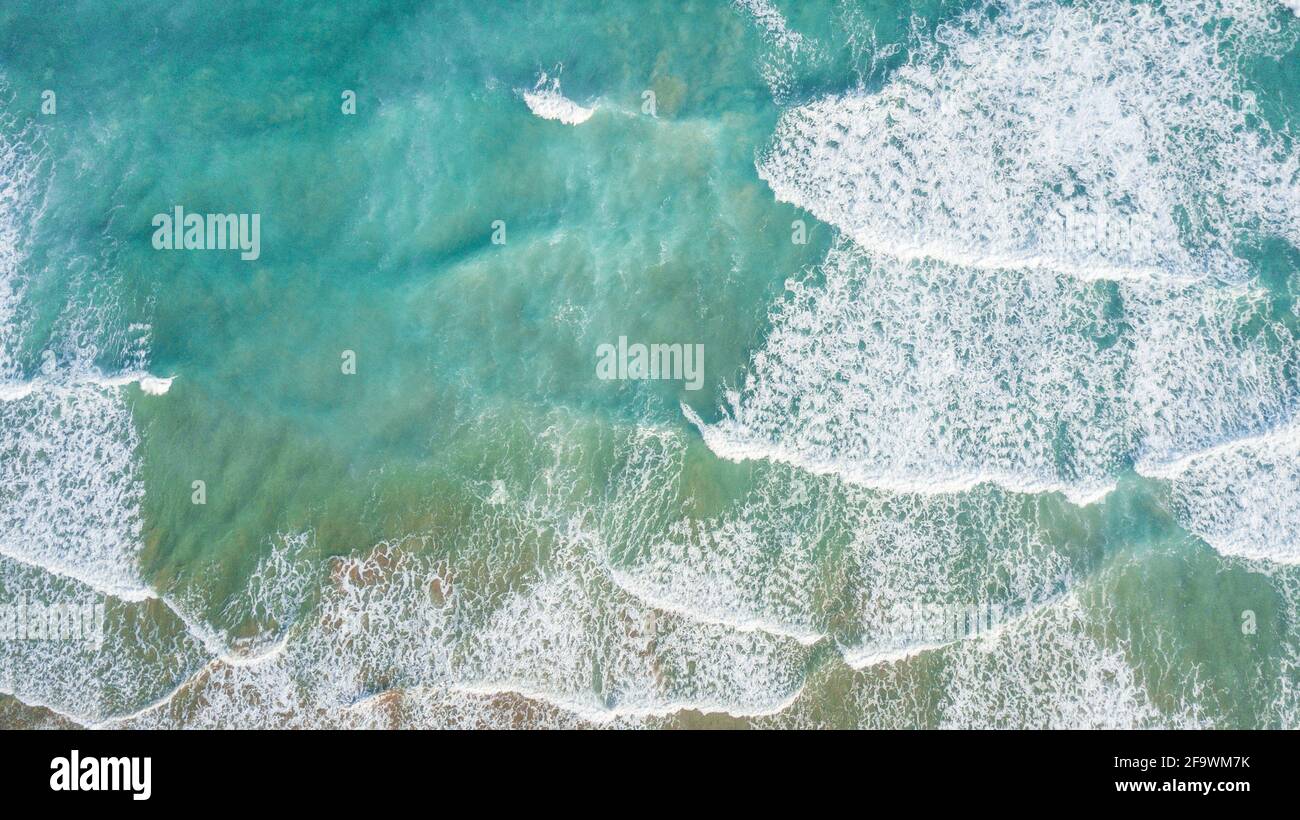 Aerial View of Waves and Beaches at Sunset Along the GrAerial View of ...