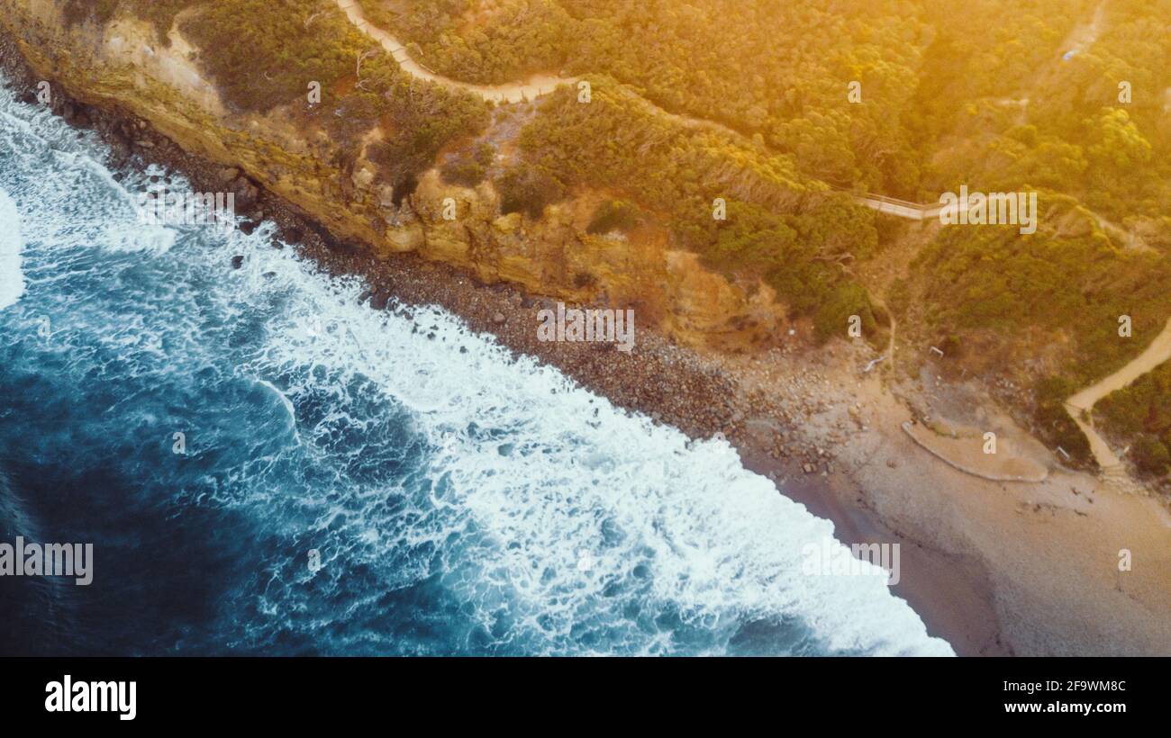 Aerial View of Waves and Beaches at Sunset Along the GrAerial View of ...