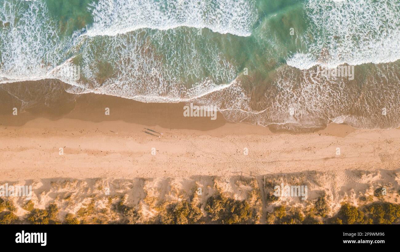 Aerial View of Waves and Beaches at Sunset Along the GrAerial View of ...