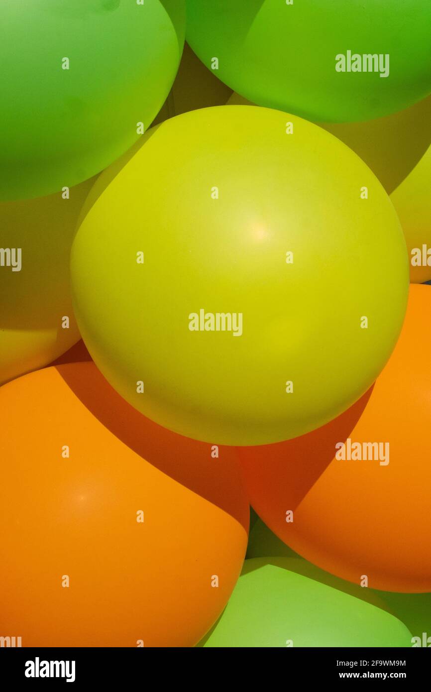 Bunch balloons kids hi-res stock photography and images - Alamy