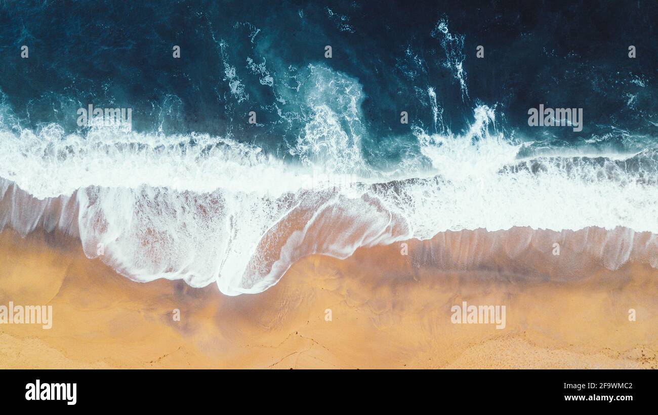 Aerial View of Waves and Beaches at Sunset Along the GrAerial View of ...