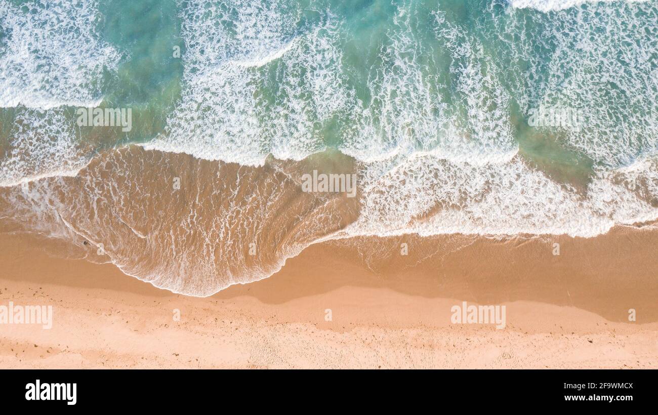 Aerial View of Waves and Beaches at Sunset Along the GrAerial View of ...