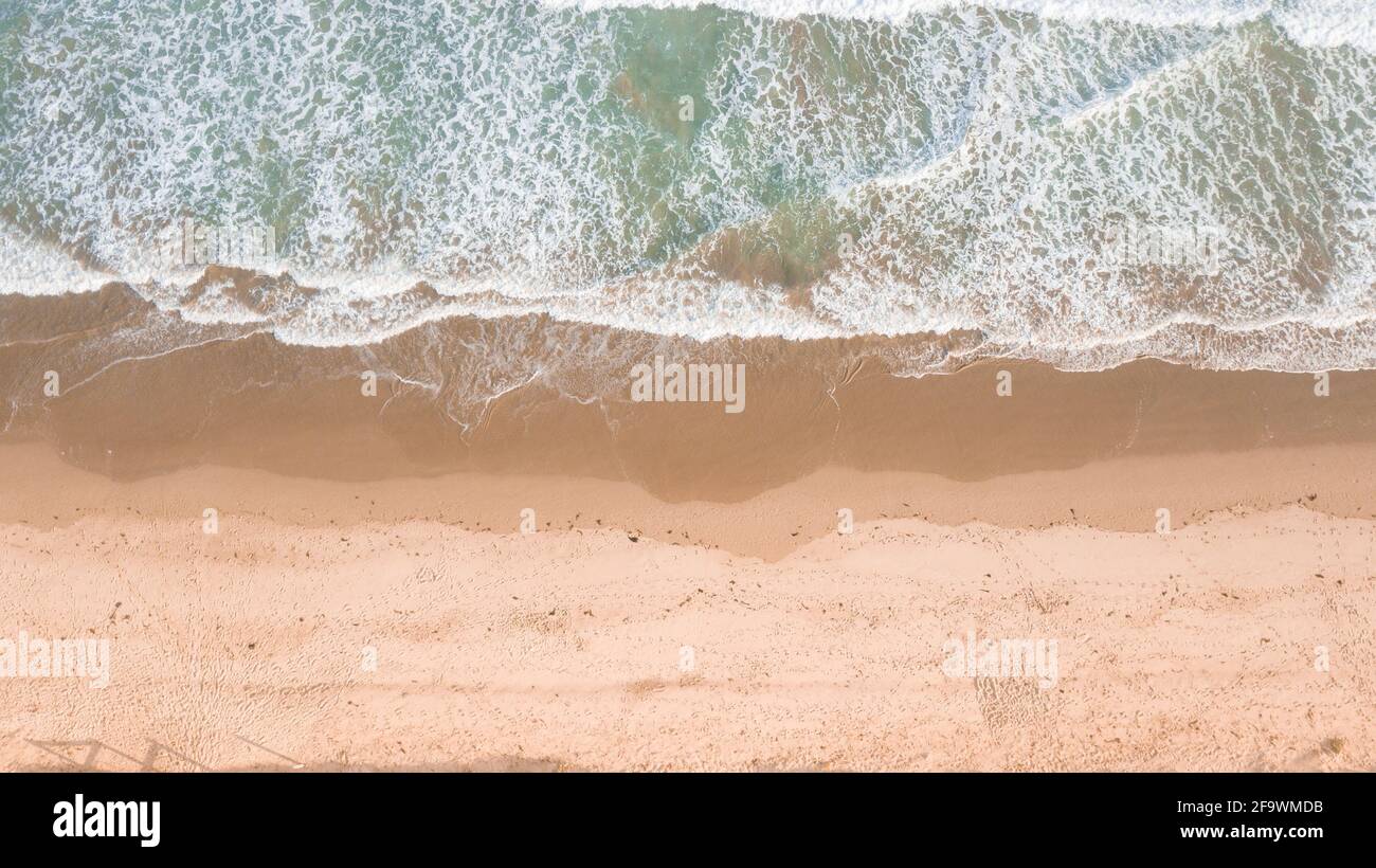 Aerial View of Waves and Beaches at Sunset Along the GrAerial View of ...
