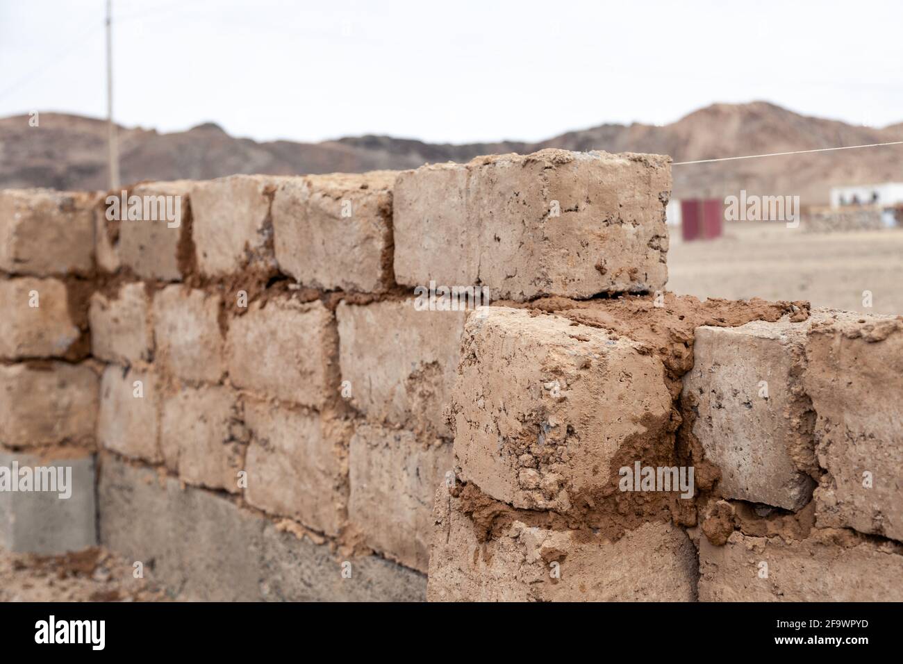 Homemade production, mini factory, drying of raw clay brick Stock Photo ...