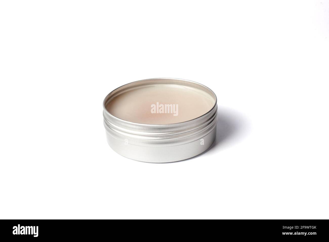 Metal jar of cream isolated on white background. Aluminum pot for ...