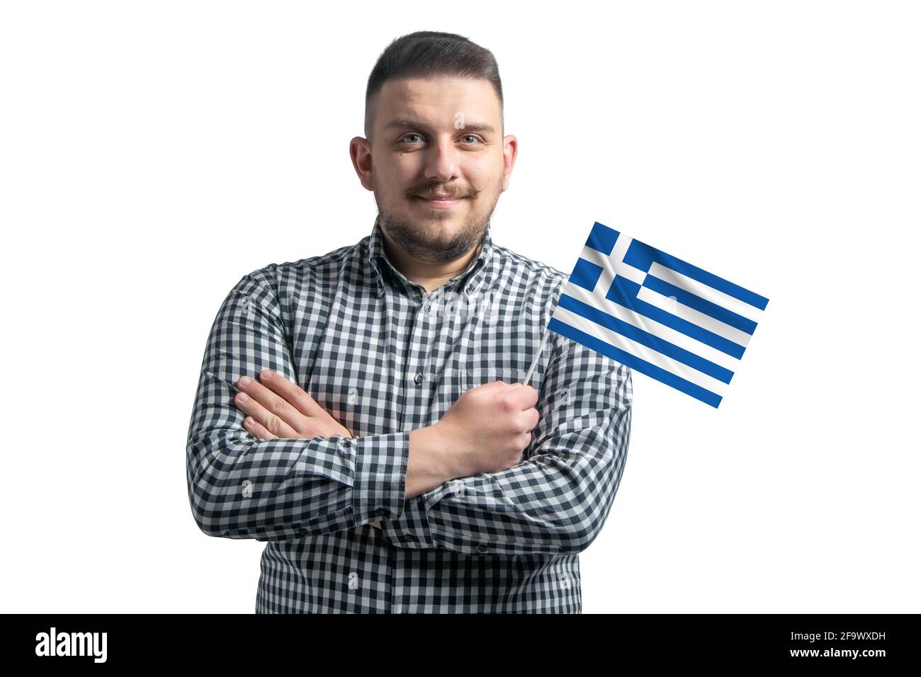 White guy holding a flag of Greece smiling confident with crossed arms ...