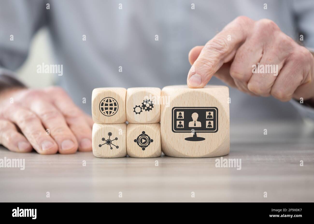 Wooden blocks with symbol of online meeting concept Stock Photo - Alamy