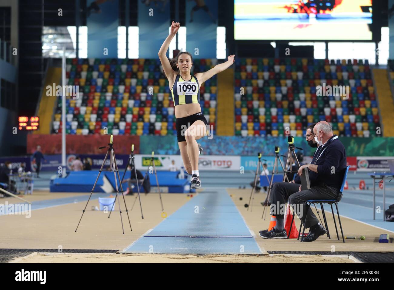 Woman long jump athletics sand hi-res stock photography and images - Alamy