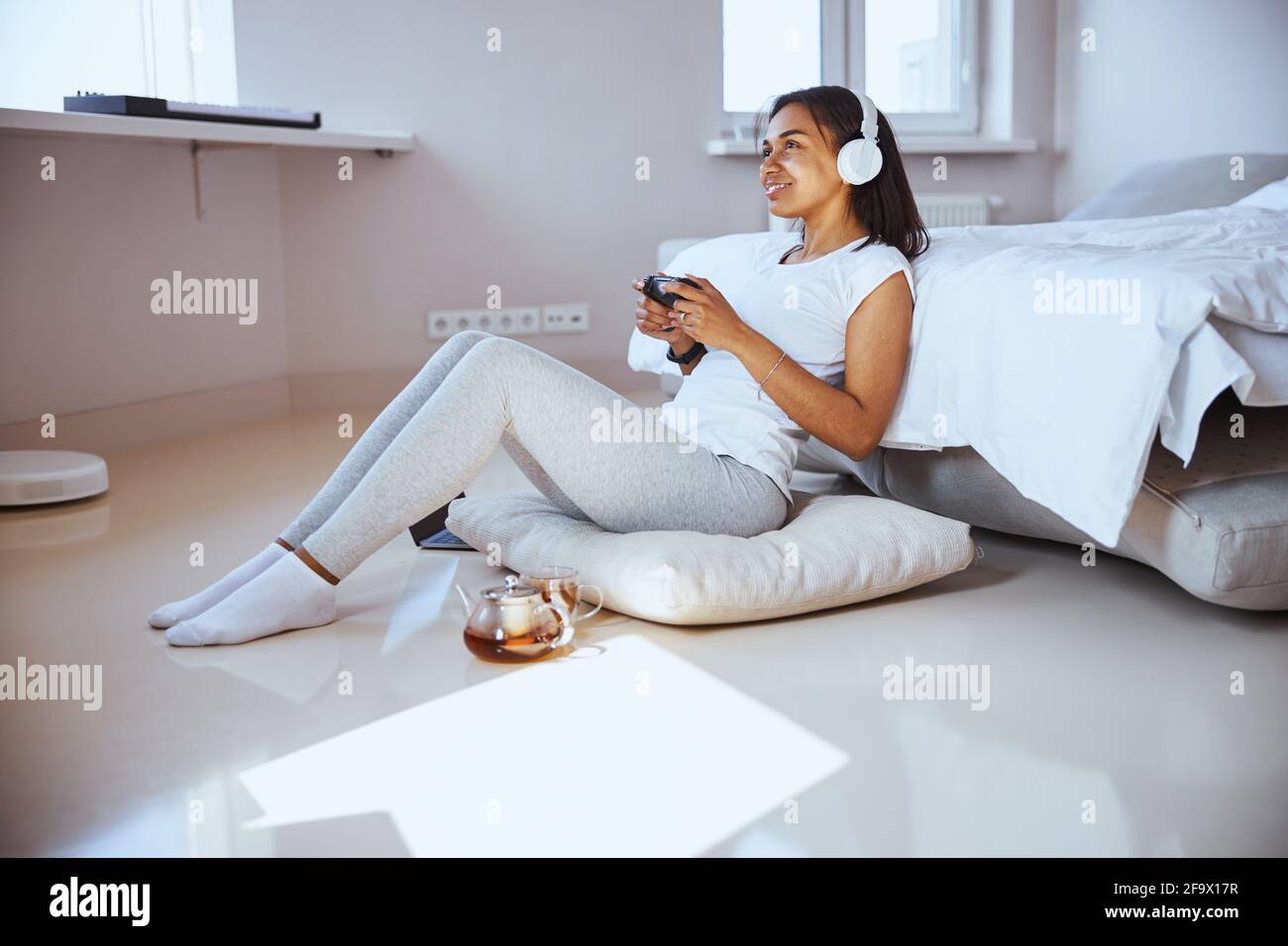 Attractive female gamer playing hi-res stock photography and images - Alamy