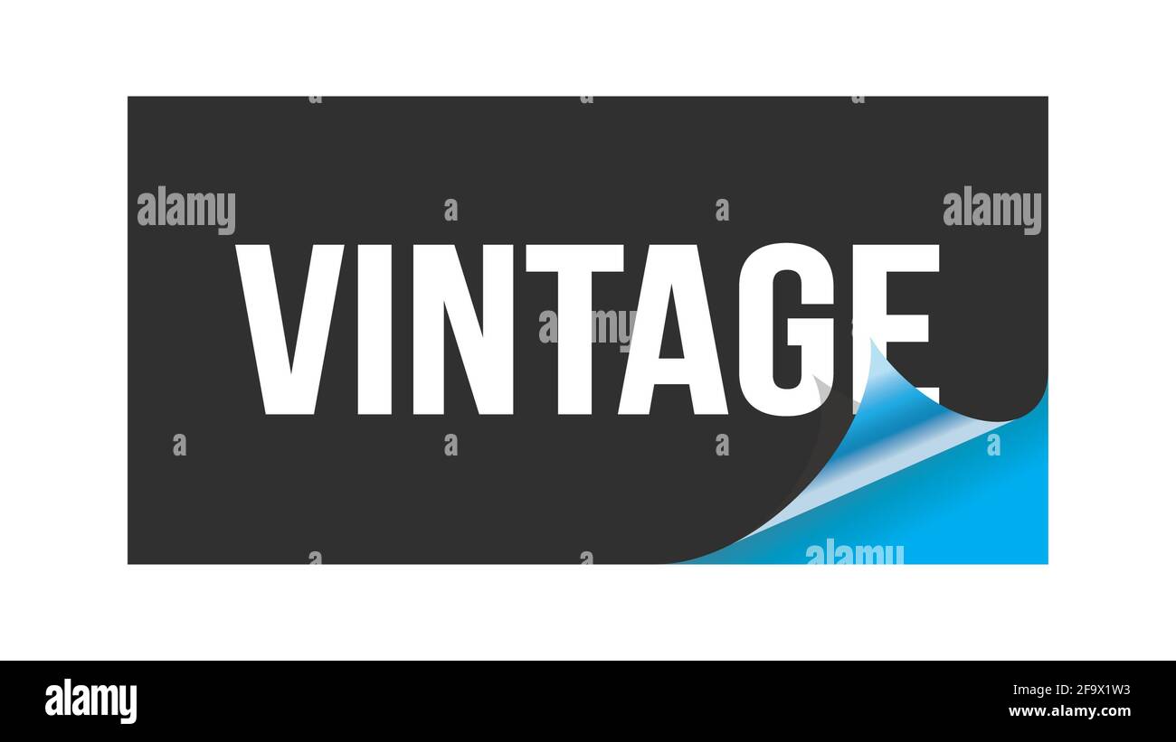 VINTAGE text written on black blue sticker stamp Stock Photo - Alamy