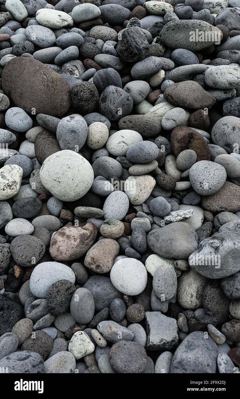 High angle shot of beautiful pebbles stacked on each other - for ...