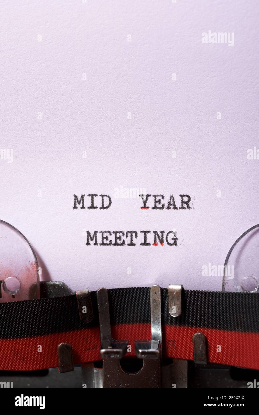 Mid year meeting phrase written with a typewriter Stock Photo - Alamy