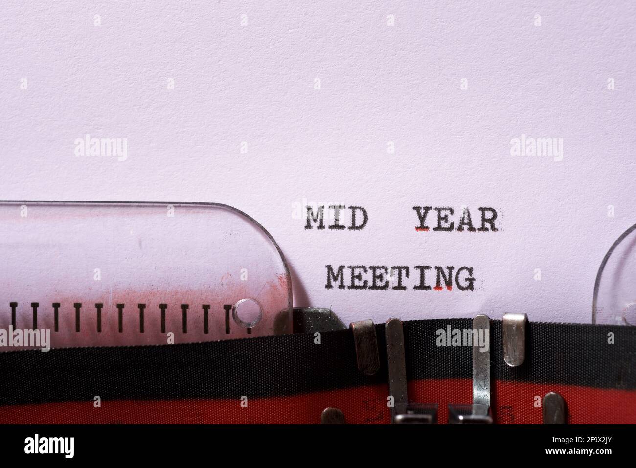 Mid year meeting phrase written with a typewriter Stock Photo - Alamy