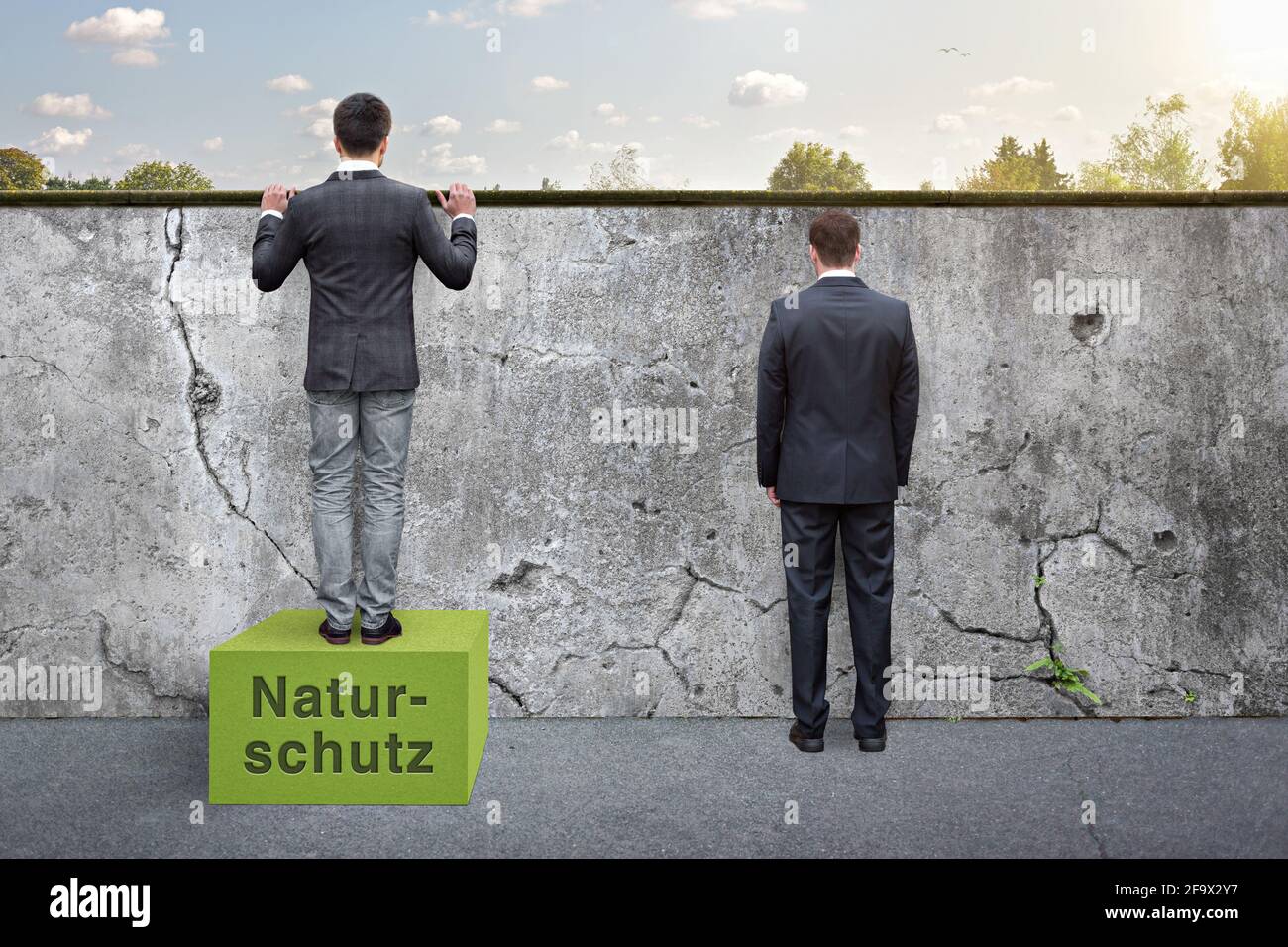 Clever man building on nature protection - awareness metaphor ...