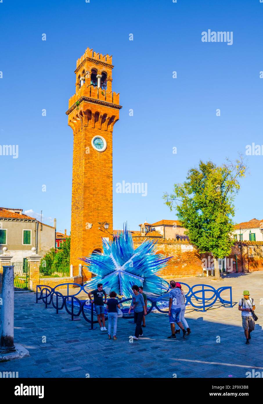 VENICE, ITALY, SEPTEMBER 20, 2015: Glass artwork of blue star and clock ...