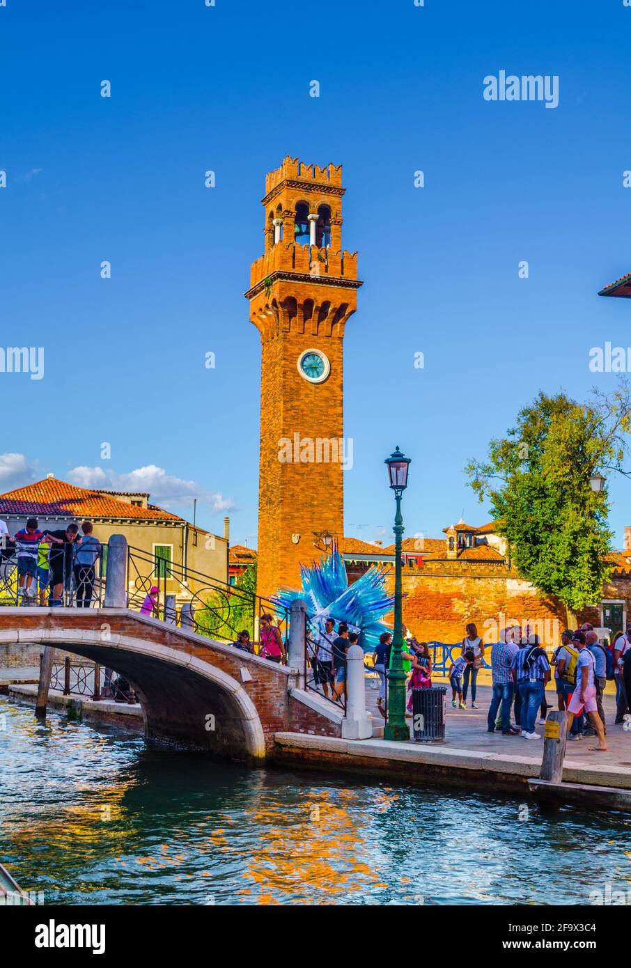 VENICE, ITALY, SEPTEMBER 20, 2015: Glass artwork of blue star and clock ...