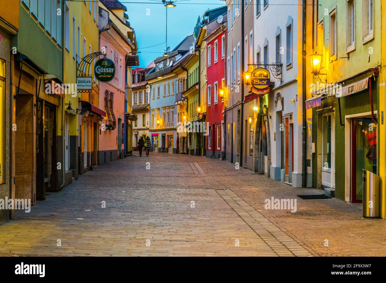 VILLACH, AUSTRIA, FEBRUARY 20, 2016: view of a narrow street full of ...