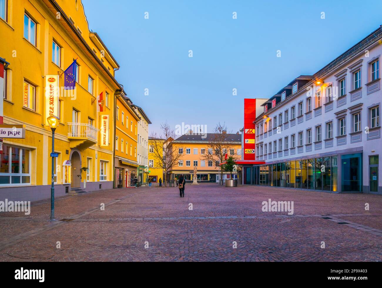 VILLACH, AUSTRIA, FEBRUARY 20, 2016: view of a narrow street full of ...