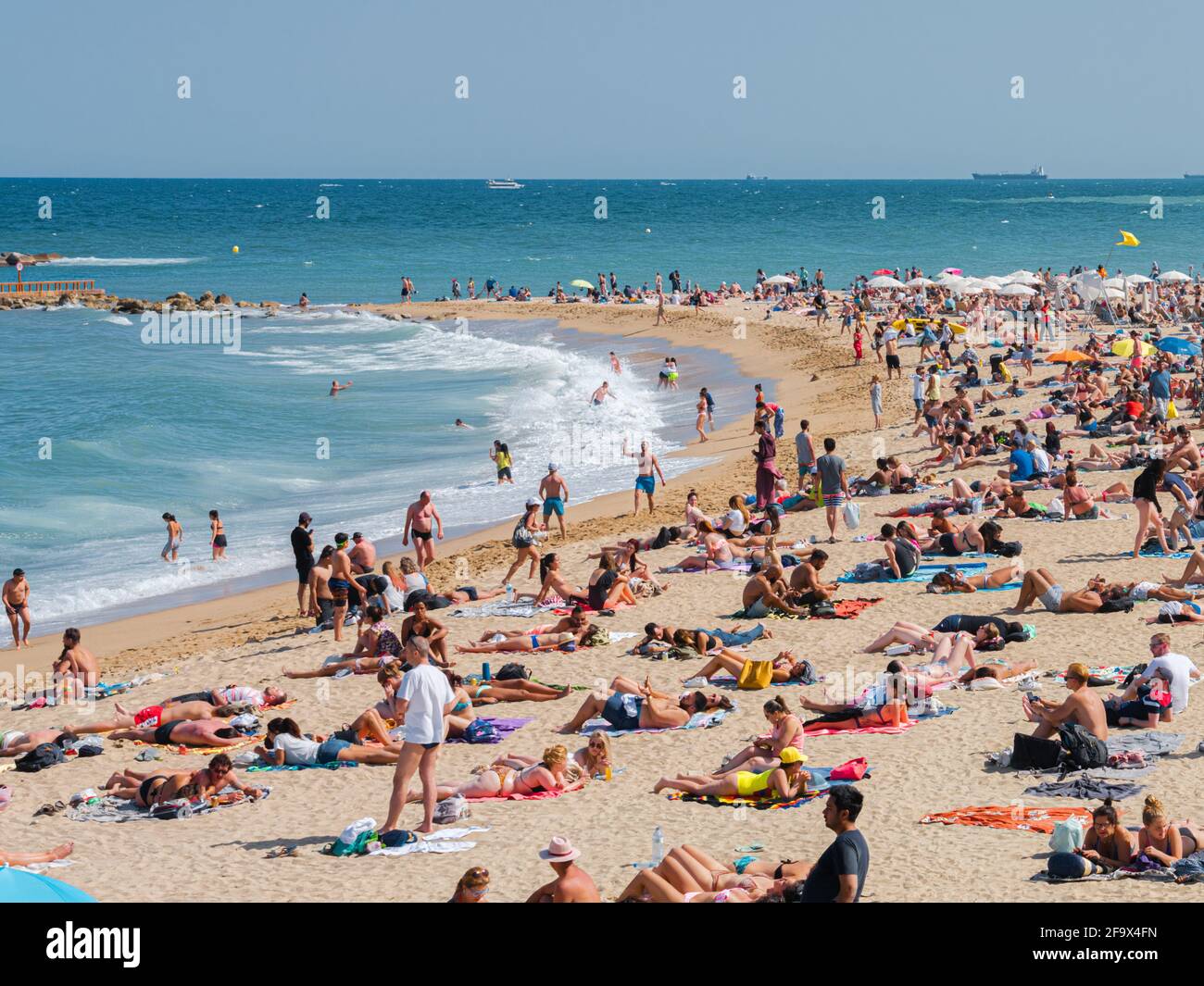 BARCELONA, SPAIN - JUNE 08, 2019: People Enjoying Summer On The Beach ...