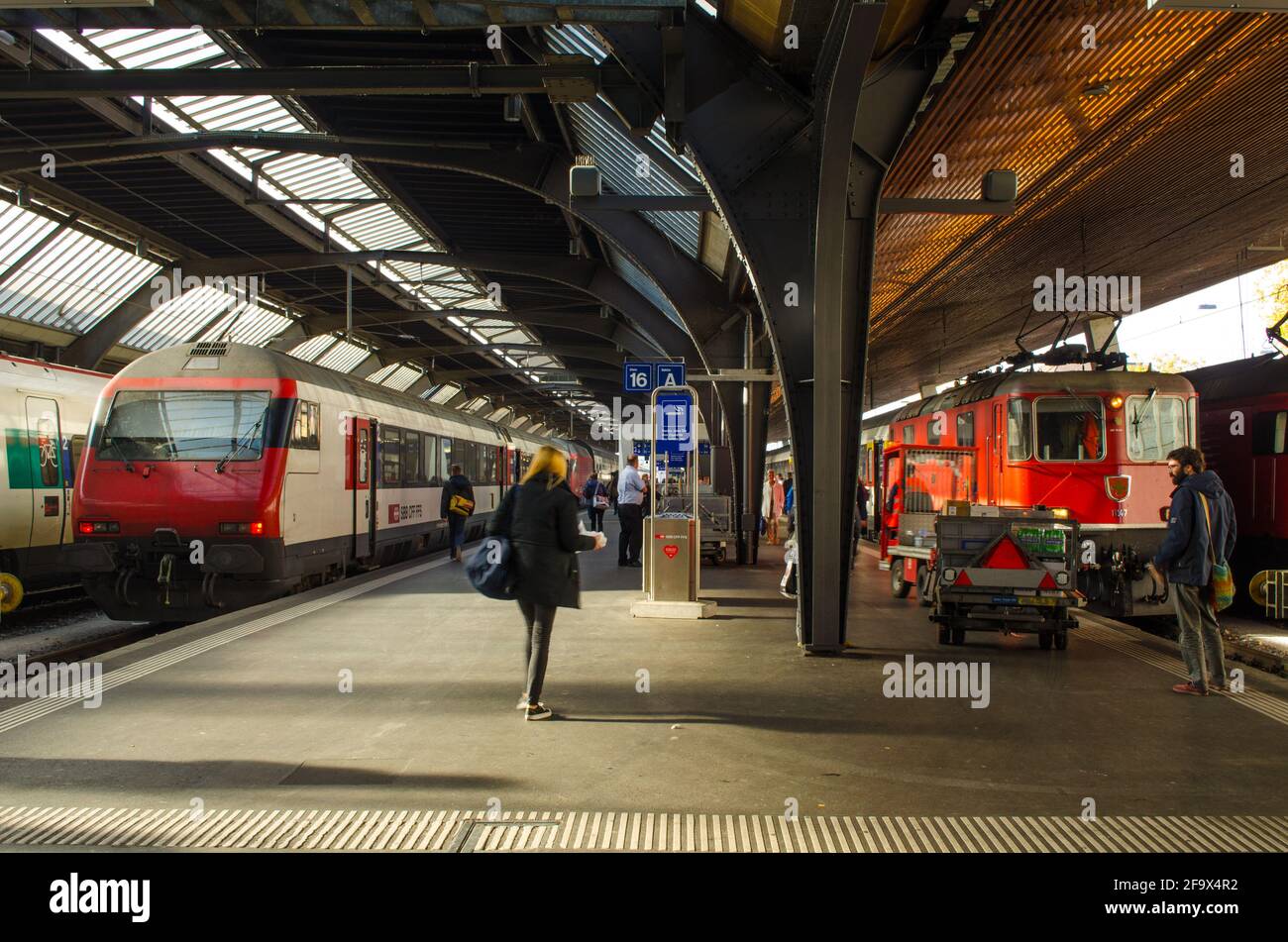 ZURICH, SWITZERLAND, OCTOBER 24, 2015: People are waiting for a train ...