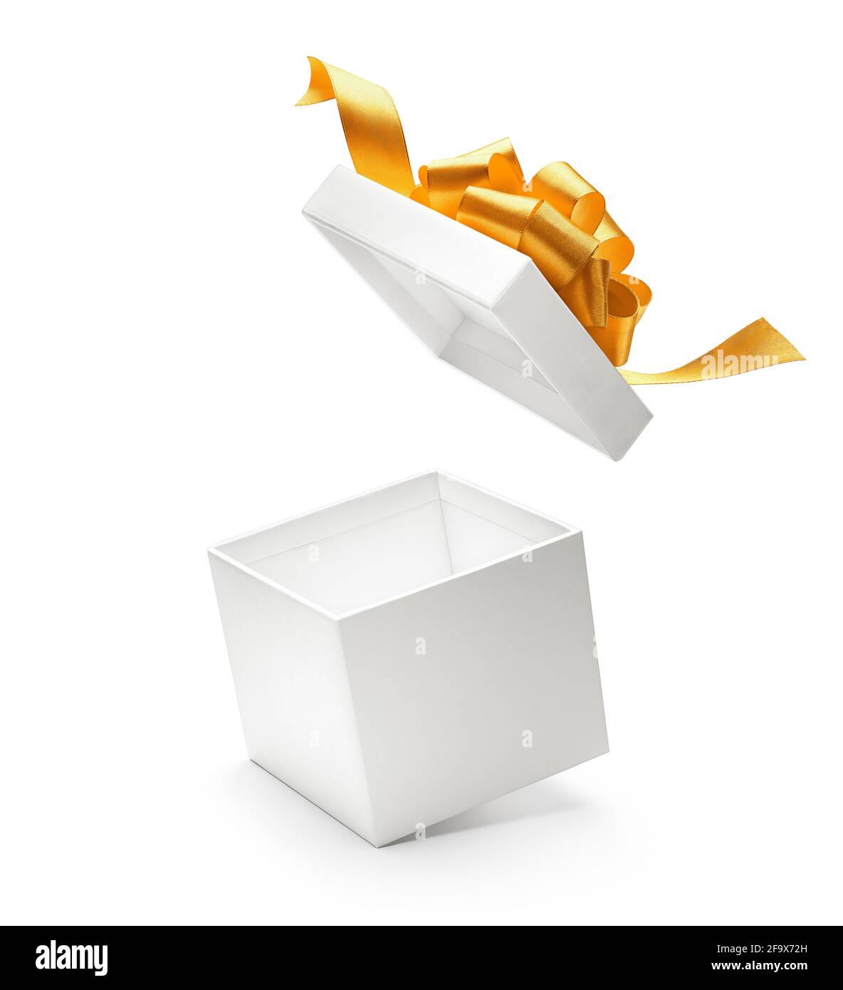 White color open gift box with gold ribbon isolated on white background ...
