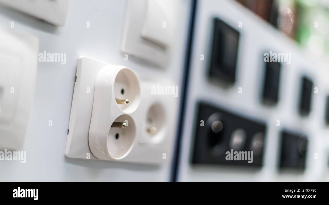 Electric sockets and switches presented in an electrical goods store ...