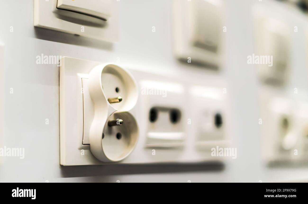 Electric sockets and switches presented in an electrical goods store ...