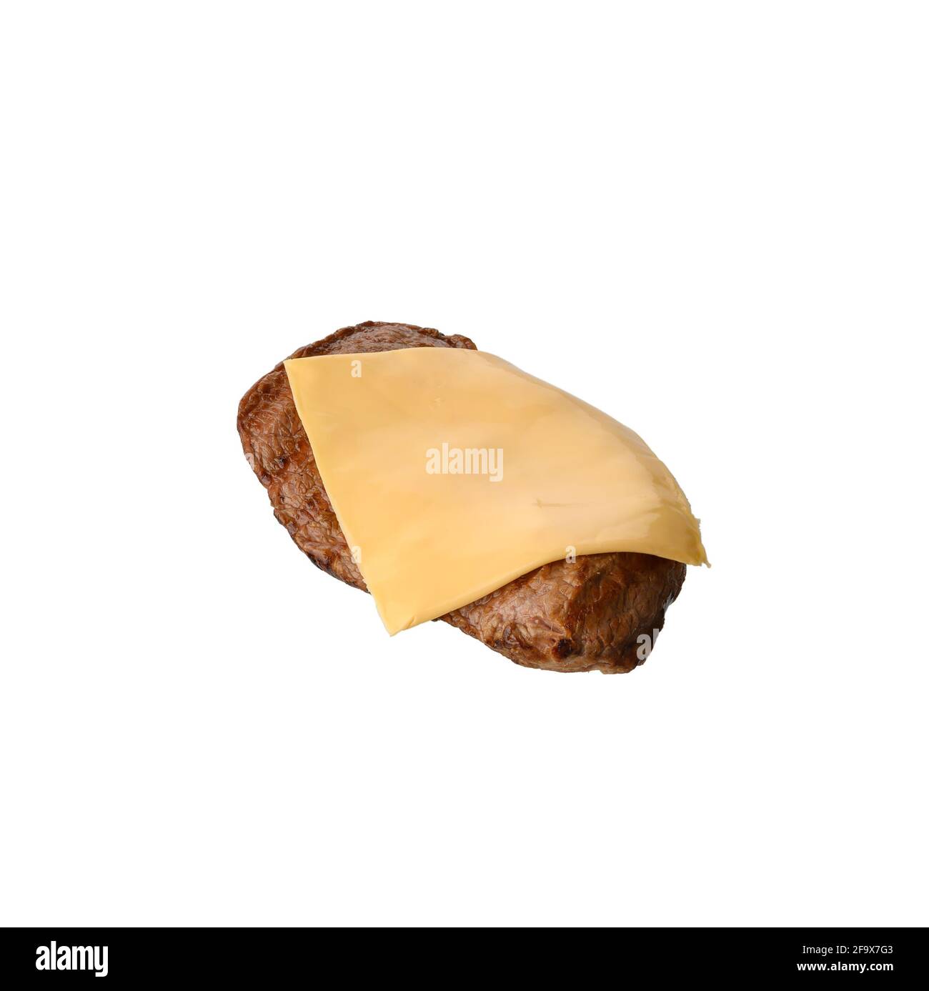 fried piece of beef and slice of cheddar cheese isolated on white ...