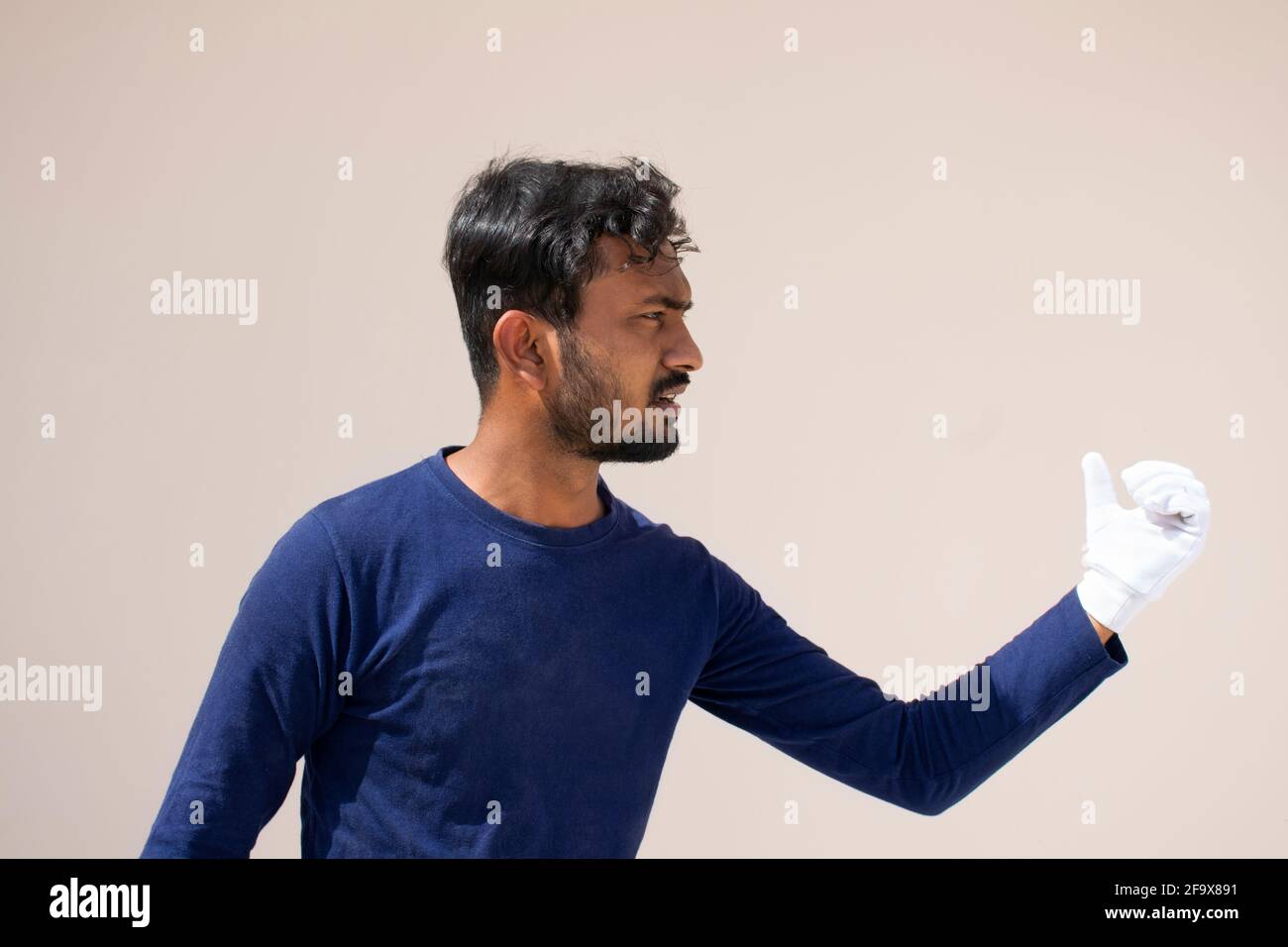 A goalkeeper pointing a soccer ball Stock Photo - Alamy