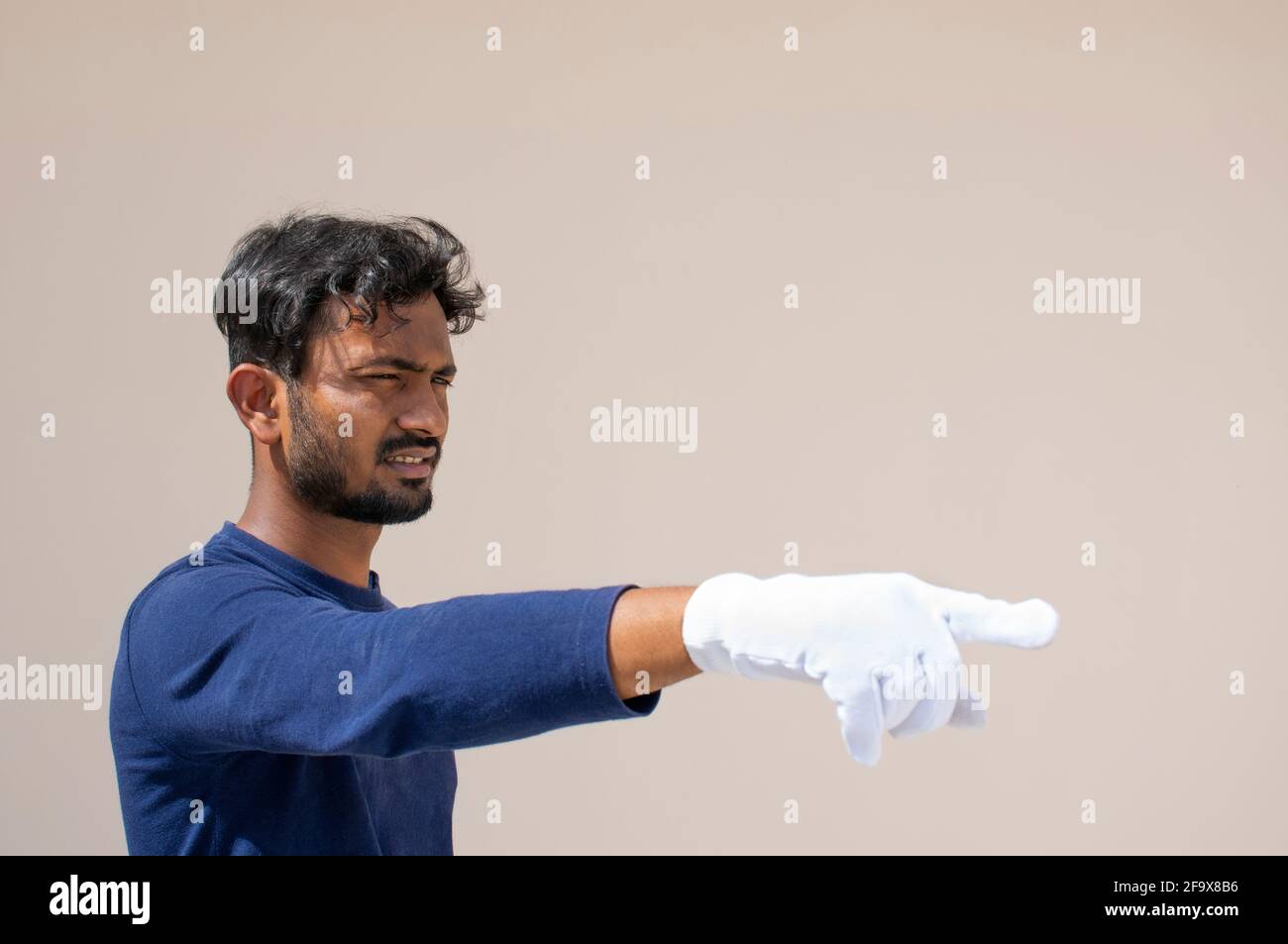 A goalkeeper pointing a soccer ball Stock Photo - Alamy