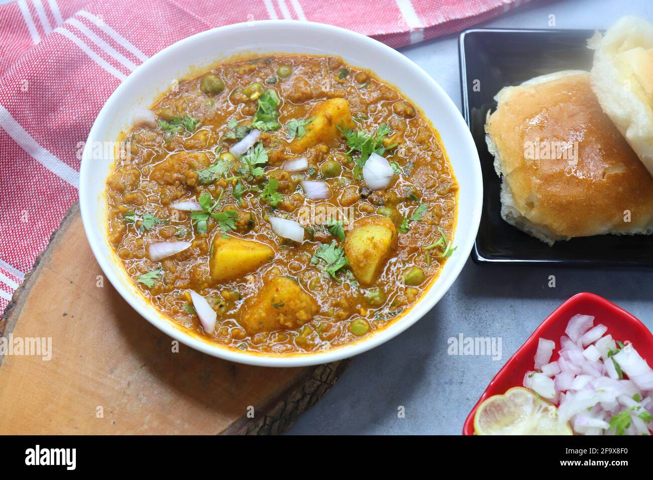Indian famous dish Mutton Kheema Pav or Khima Paav is a minced goat ...