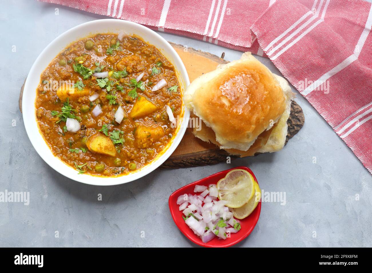 Indian famous dish Mutton Kheema Pav or Khima Paav is a minced goat ...