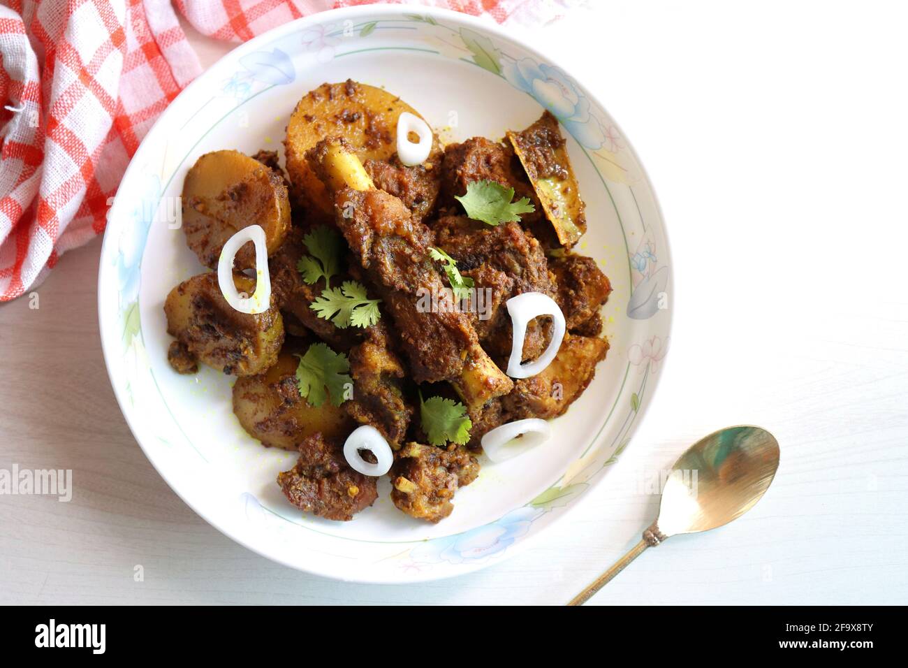 Mutton ghee roast. Goat meat fry with potatoes, also known as Mutton ...