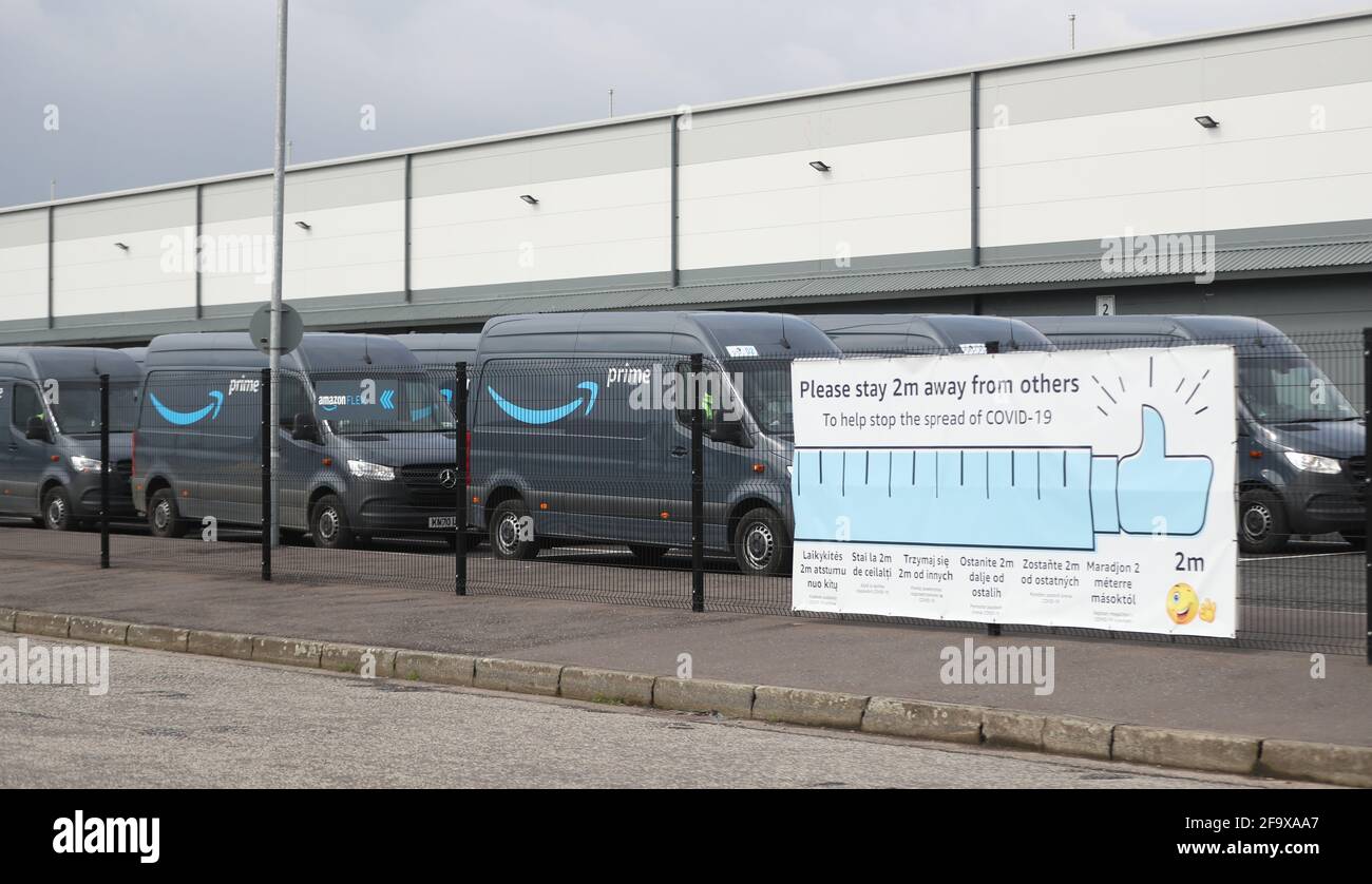 Electric delivery vans leave the Amazon warehouse in the Titanic ...