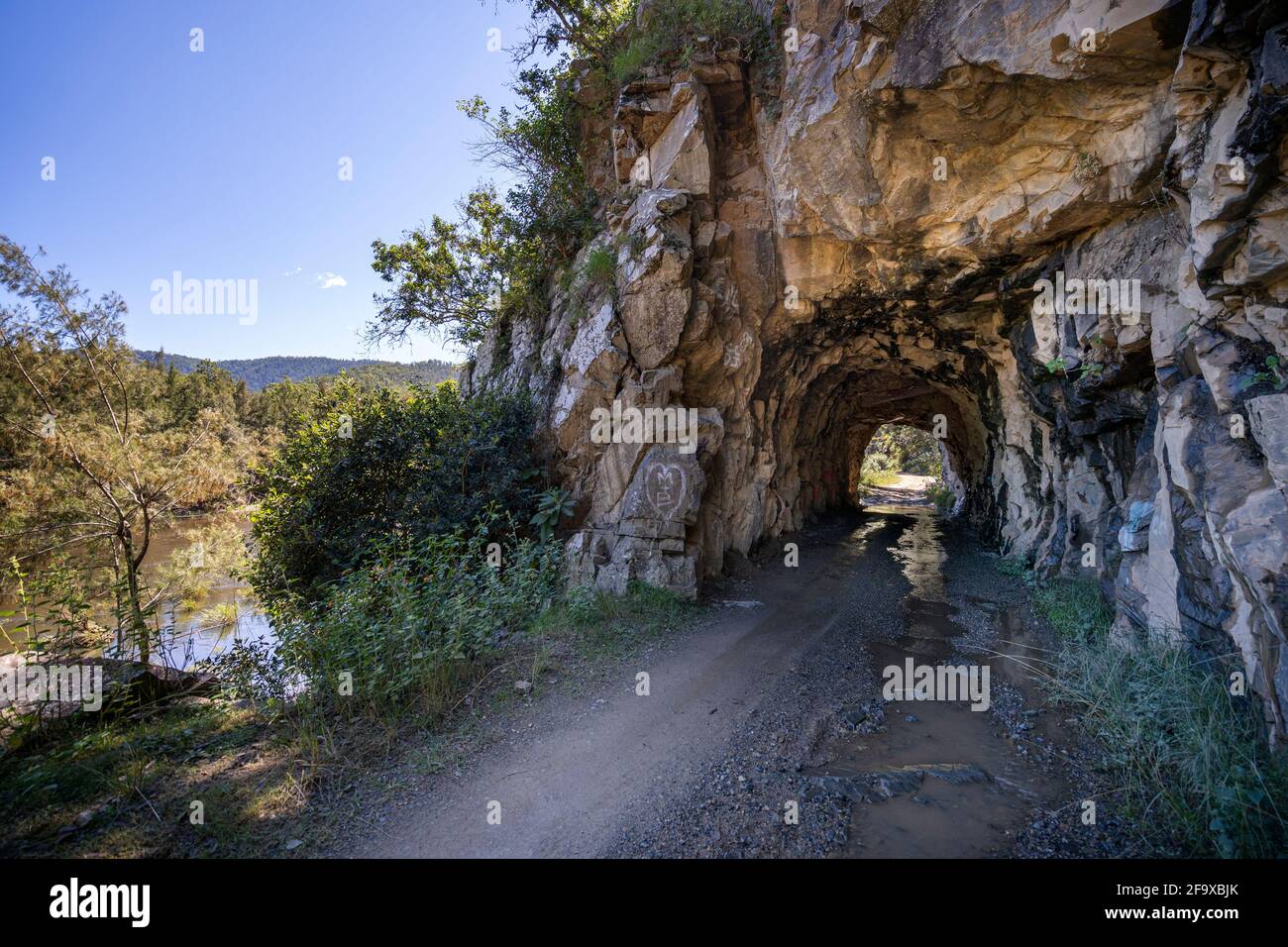 Tunnel cut through rock on historic Old Grafton Road, New England ...