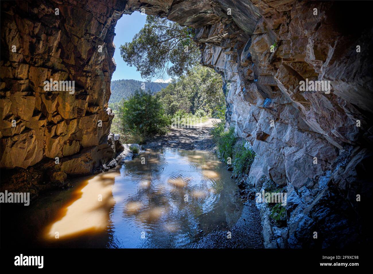 Tunnel cut through rock on historic Old Grafton Road, New England ...